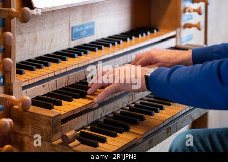 Man playing pipe organ in a church Stock Photo - Alamy