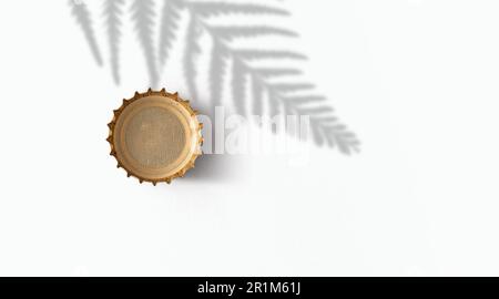Gold beer bottle caps on a white background .beer fiesta concept Stock ...