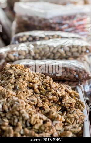 Peeled walnuts for sale in a market stall Stock Photo - Alamy