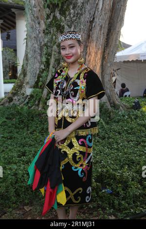 A beautiful Bidayuh lass in her traditional dress, Kuching, Sarawak ...