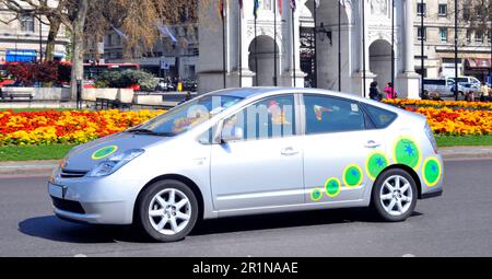 Toyota Prius a Hybrid car combining internal combustion engine with ...