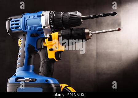 Two cordless drilsl with drill bits working also as screw guns Stock ...