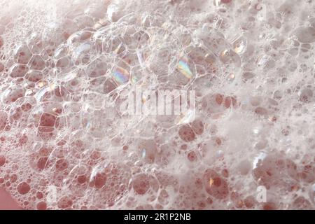 White washing foam on pale pink background, closeup Stock Photo - Alamy
