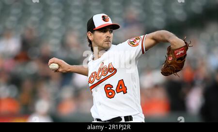 Baltimore Orioles starting pitcher Dean Kremer throws a pitch during ...
