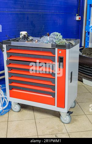 Professional toolbox with modern tools at garage Stock Photo - Alamy