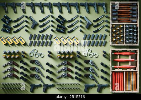 Weapons and military boxes full of ammunition. Army accessories. War ...