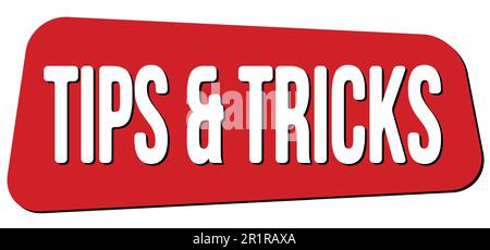 TIPS & TRICKS text written on blue lines stamp sign Stock Photo - Alamy