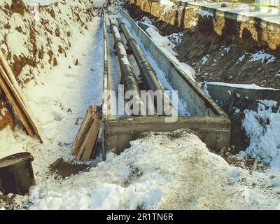 small, narrow pipes for laying plumbing communications during the ...