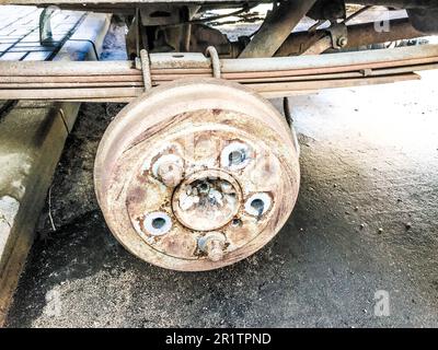 Old rusty worn drum brakes of a truck, car. Automotive suspension ...