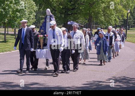 The procession at the beginning of a May Crowning service in Flushing ...