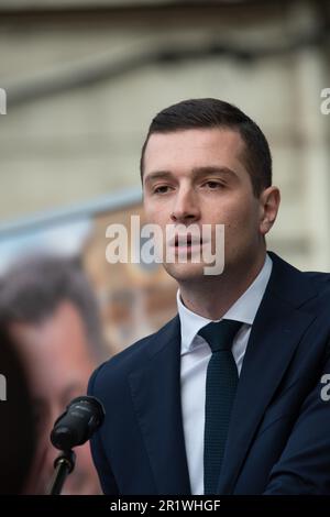 Rassemblement National President Jordan Bardella is surrounded by ...