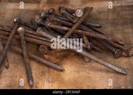old rusty, 16 penny nails, pile of heavy penny nails for construction ...