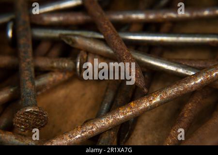 old rusty, 16 penny nails, pile of heavy penny nails for construction ...
