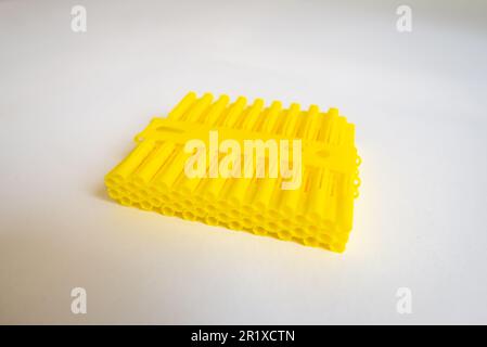 Packet of plastic wall plugs Stock Photo - Alamy