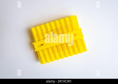Packet of plastic wall plugs Stock Photo - Alamy