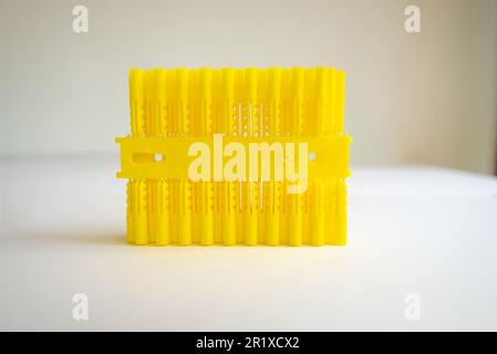 Packet of plastic wall plugs Stock Photo - Alamy