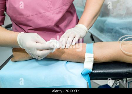 Hand disinfection with alcohol wipe. Preparation for vaccine, insulin ...