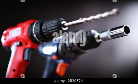 A screw gun and a pistol-grip cordless drill Stock Photo - Alamy