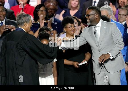 Chicago Mayor Brandon Johnson, right, stands with his family from left ...