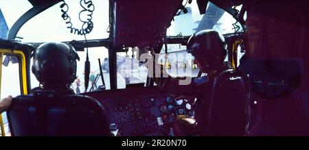 HMS Invincible crew preparing Sea King helicopter, 1984 Stock Photo - Alamy
