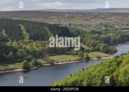 An RAF A-400 Atlas flys over Derwent Dam on the Dambusters 80th ...