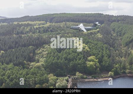 An RAF A-400 Atlas flys over Derwent Dam on the Dambusters 80th ...