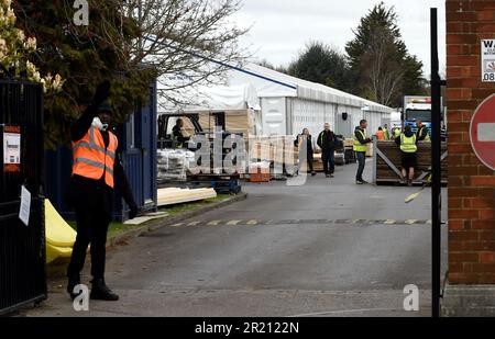 Photograph of a temporary mortuary being constructed in the main car ...