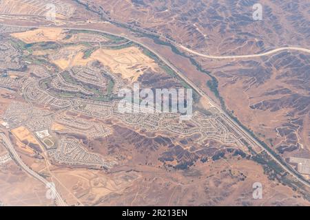 Aerial view of gated planned communities, construction, highways and ...