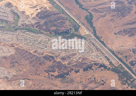 Aerial view of gated planned communities, construction, highways and ...