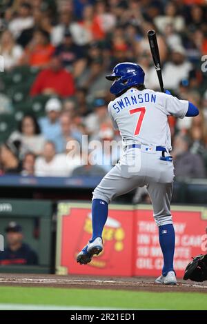 Chicago Cubs shortstop Dansby Swanson throws to first during the first ...