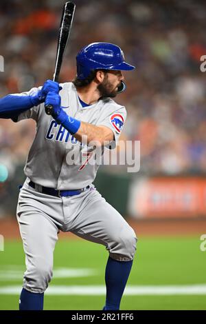 Chicago Cubs shortstop Dansby Swanson throws to first base after ...