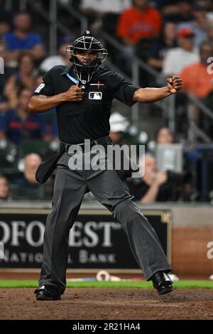 Home plate umpire Umpire Edwin Moscoso (32) calls a third strike during ...