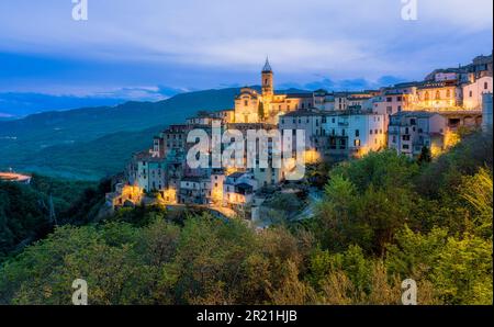 Medieval village at sunset, ancient illuminated roads with arc Stock ...