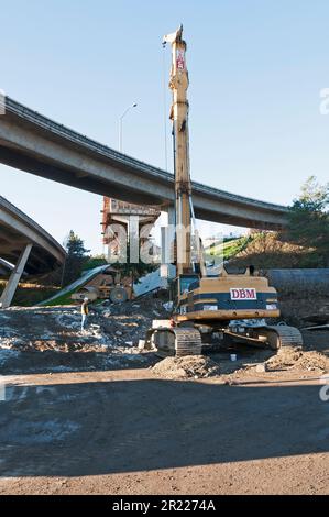 A drilling rig for digging drilled shafts to support freeway on-ramps ...