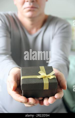 Photographing the joy of giving gifts on anniversaries with the concept ...