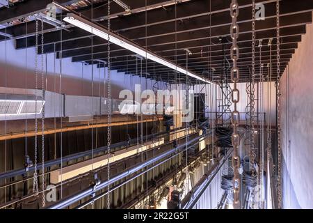 Theater stage rigging with theatrical equipment, lighting, supports ...