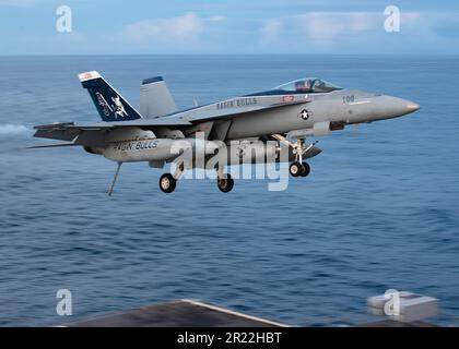The Gerald R. Ford Carrier Strike Group sails in formation during a ...