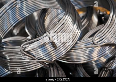Skeins of lead rod material for shells manufactured at plant Stock ...