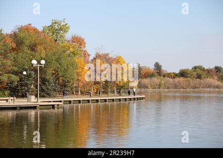 Walking paths around Wascana Lake in Regina, Saskatchewan in early fall ...