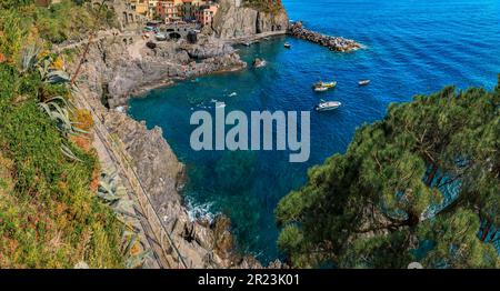 Iconic Italian town of Manarola from Cinque Terre at night Stock Photo ...