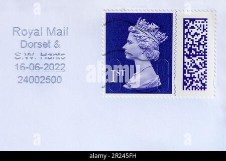 purple 1st class stamp with Queen Elizabeth II head, stuck on envelope ...