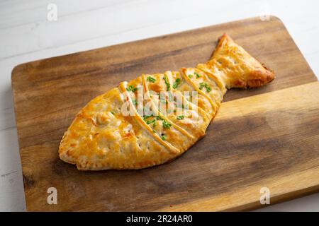 Fish-shaped puff pastry stuffed with tuna Stock Photo - Alamy