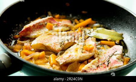 Plate of top quality red mullets cooked in the oven with vegetables in ...
