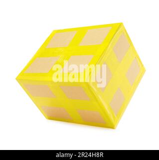 Cardboard parcel box with yellow sticky tape on white background Stock ...