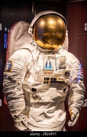 Space shuttle astronaut in EMU space suit at NASA Johnson Space Center ...