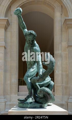 Statue of Hercules fighting a snake at the Louvre Museum Stock Photo ...