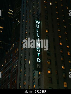 Wellington Hotel vintage sign at night, Midtown Manhattan, Manhattan ...
