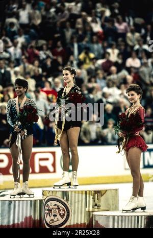 Gold medalist Debi Thomas (C), Silver medalist Jill Trenary (L) and ...