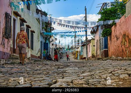 Authentic old Cuban street with vibrant colors and locals living their ...
