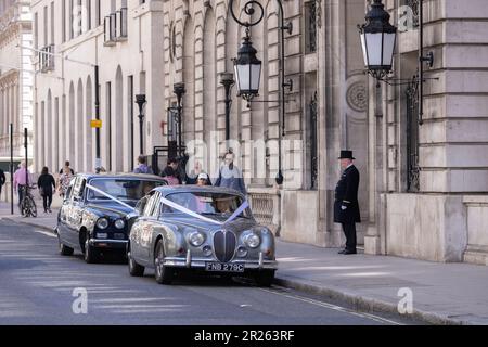 Wedding cars outside the The Royal Automobile Club situated on Pall ...